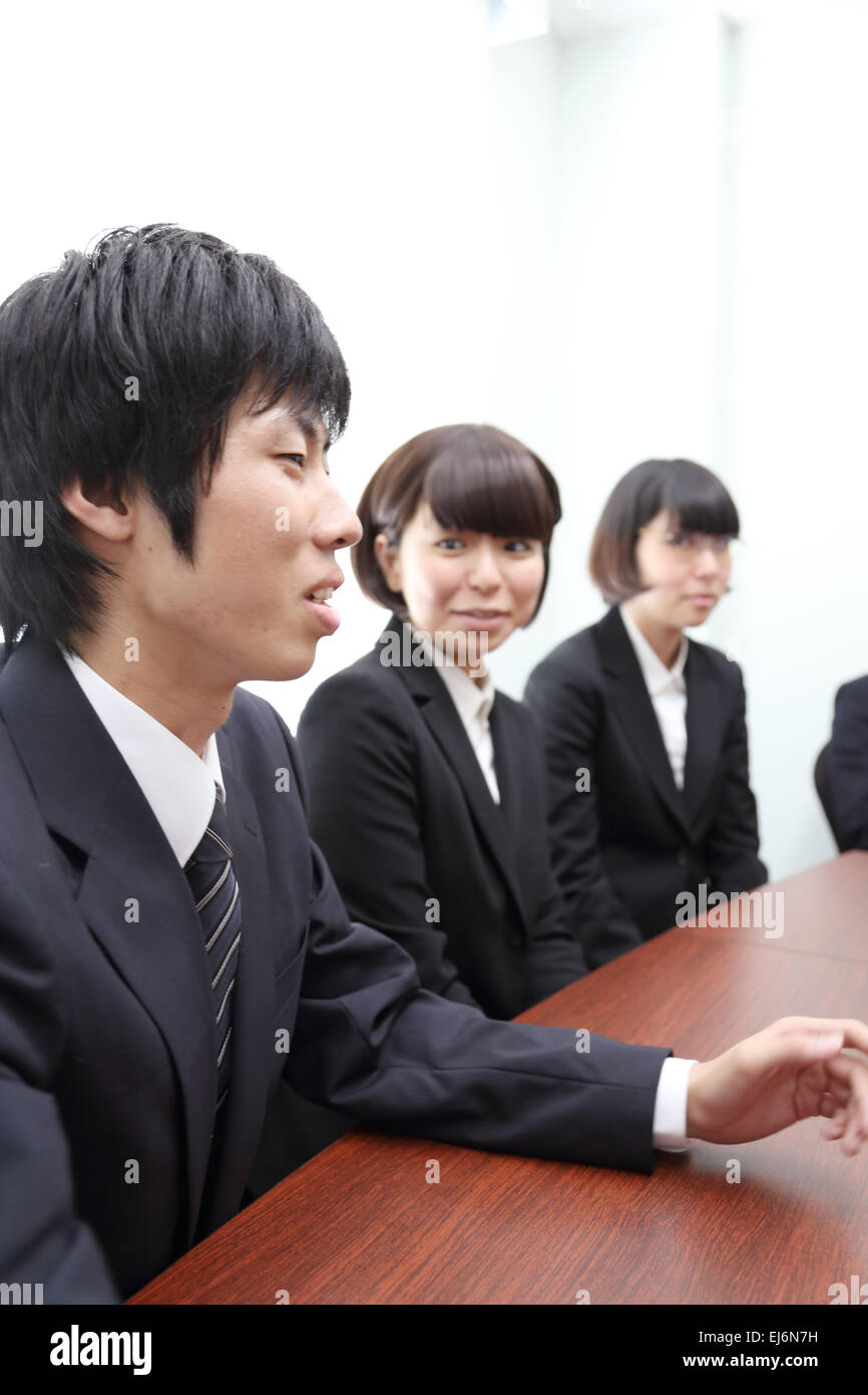 Young Japanese business people work examination Stock Photo - Alamy