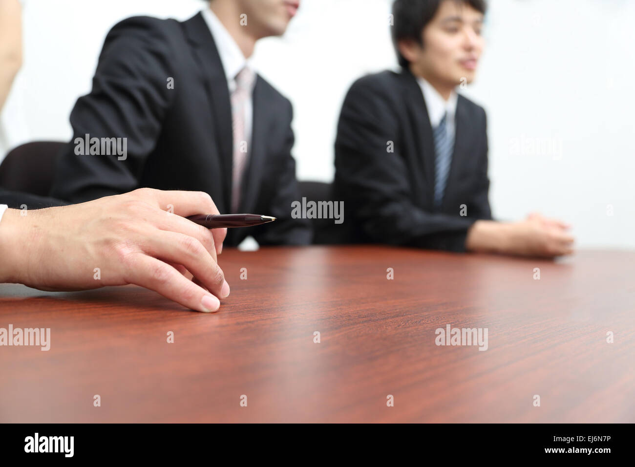 Young Japanese business people work examination Stock Photo - Alamy