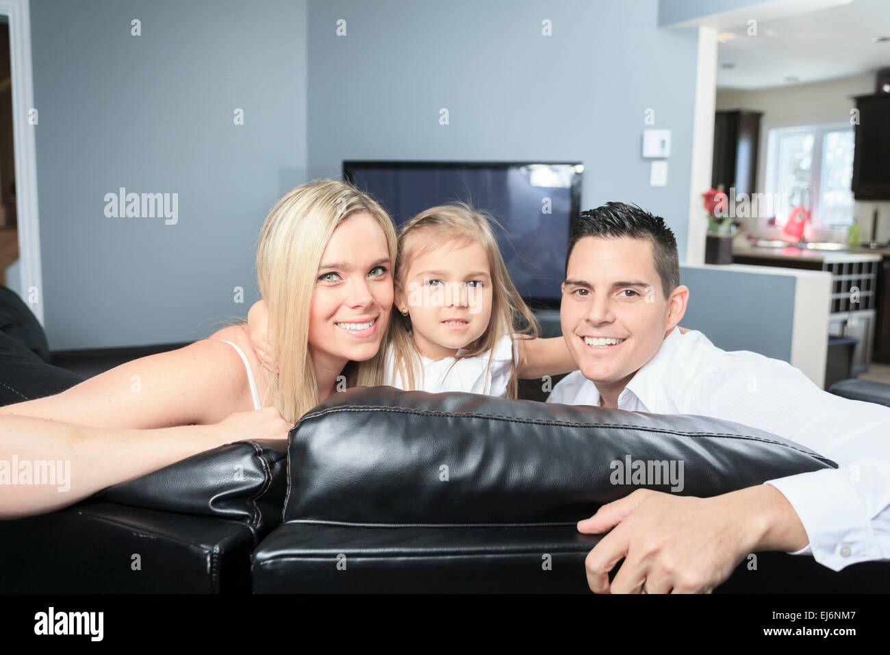 watching TV together at home Stock Photo - Alamy