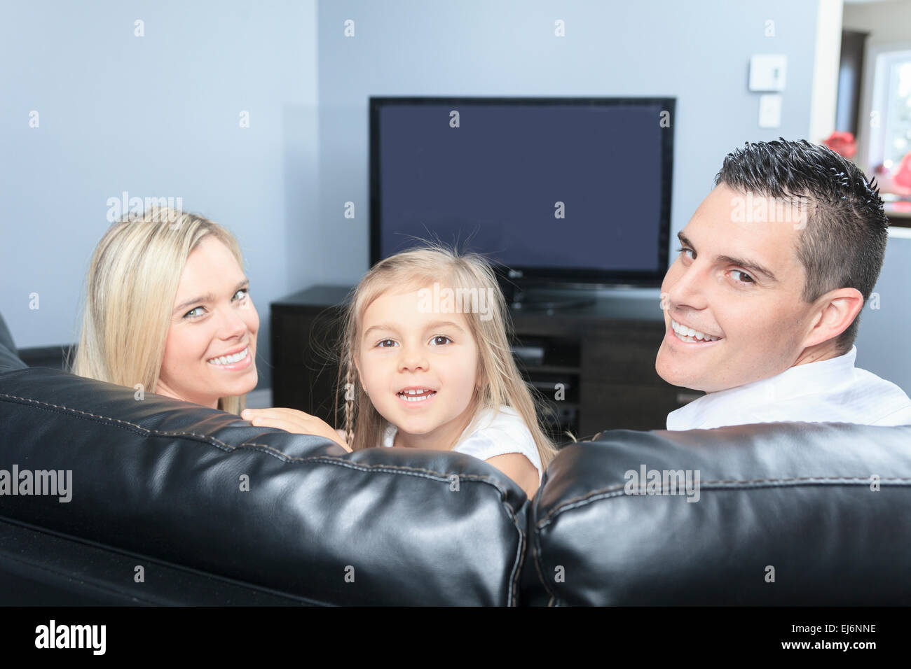 watching TV together at home Stock Photo - Alamy