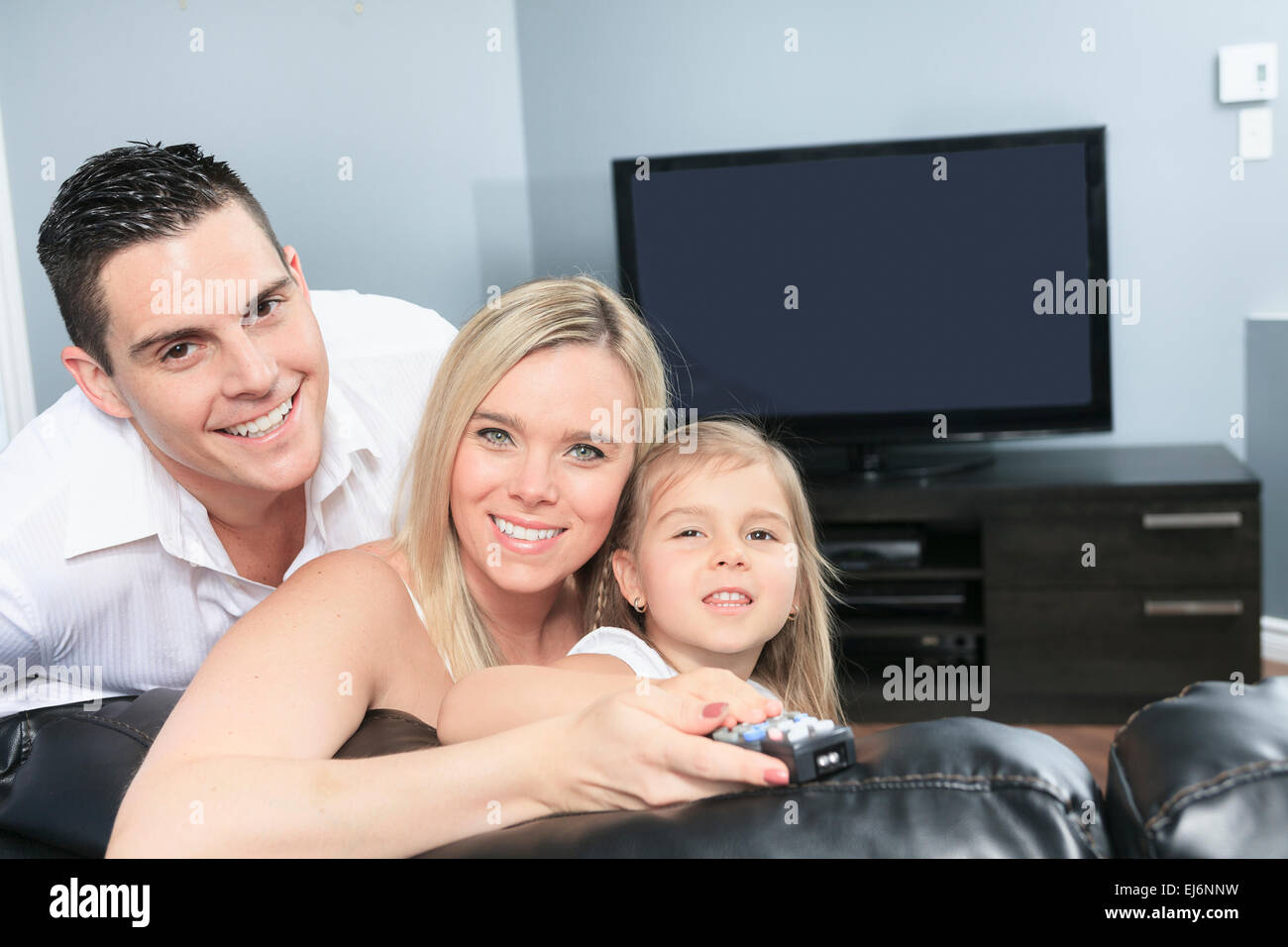 watching TV together at home Stock Photo - Alamy