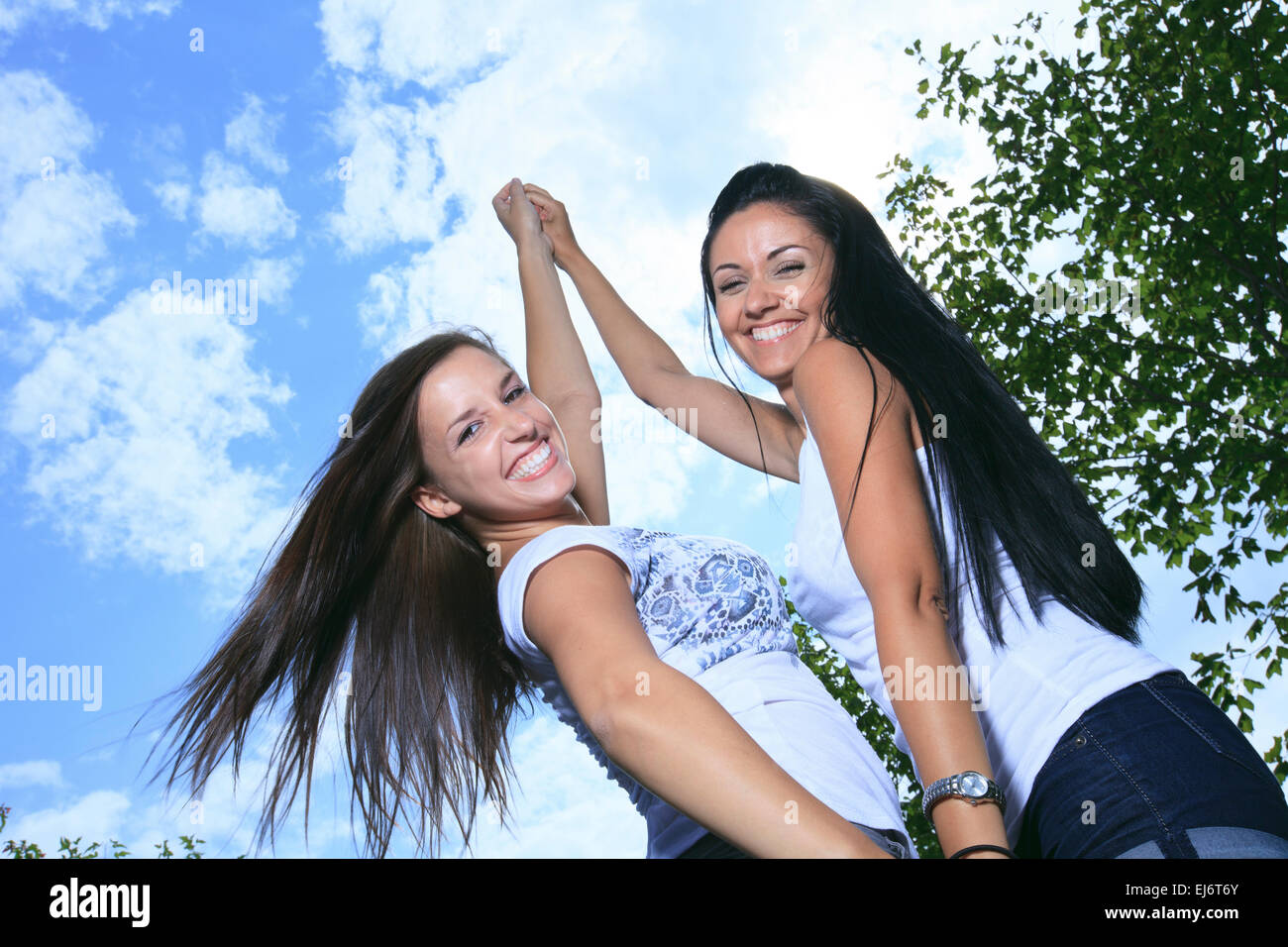 friend portrait over a green nature background Stock Photo - Alamy