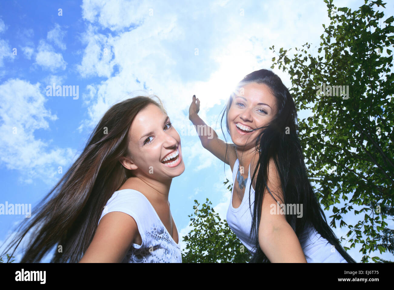 friend portrait over a green nature background Stock Photo - Alamy