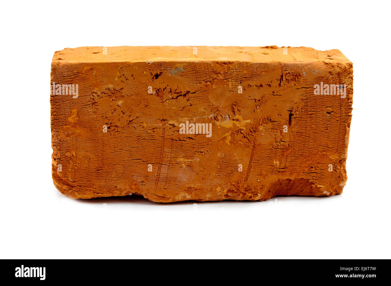 red solid brick on a white background Stock Photo - Alamy