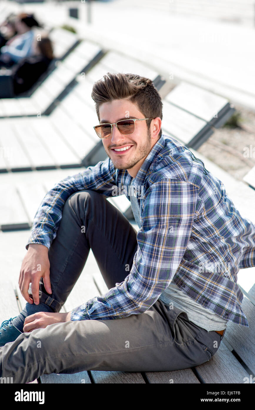 Portrait of a young handsome man outdoor Stock Photo - Alamy