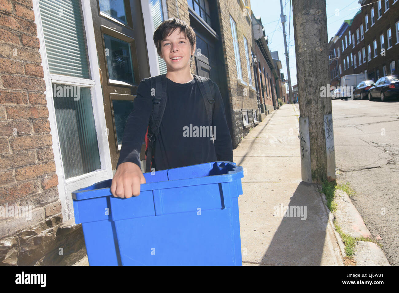 Child recycling bin hi-res stock photography and images - Alamy