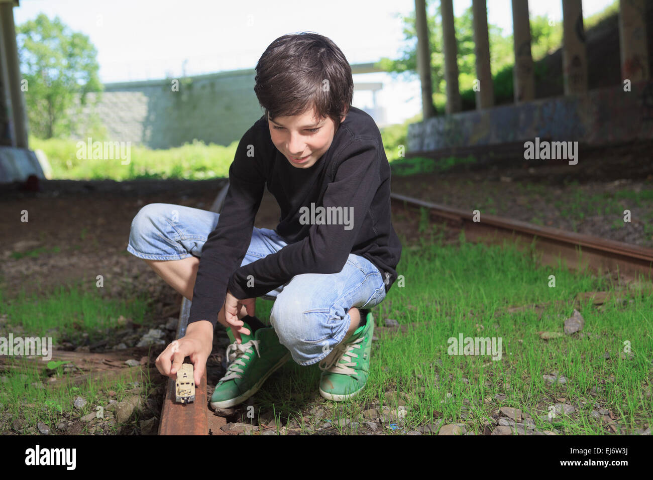 A young boy railroad Stock Photo - Alamy