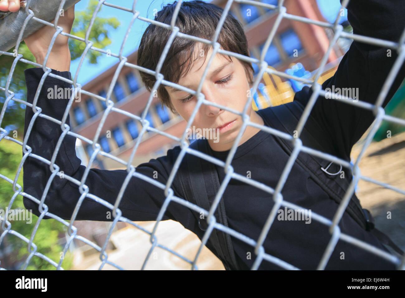 Child sad playground hi-res stock photography and images - Alamy