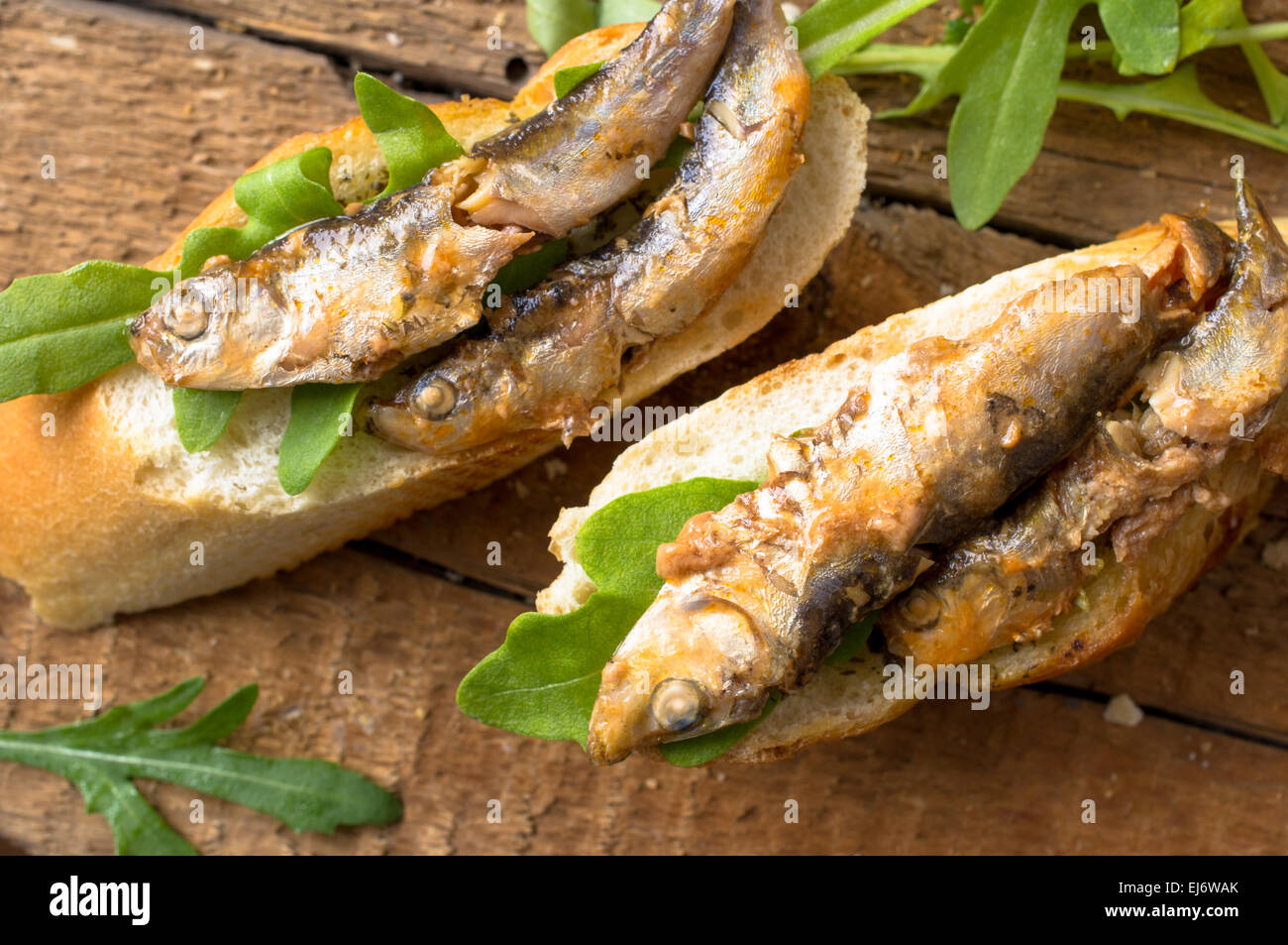 Tapas, pintxos, pinchos spanish appetizer with arugula and fish ...