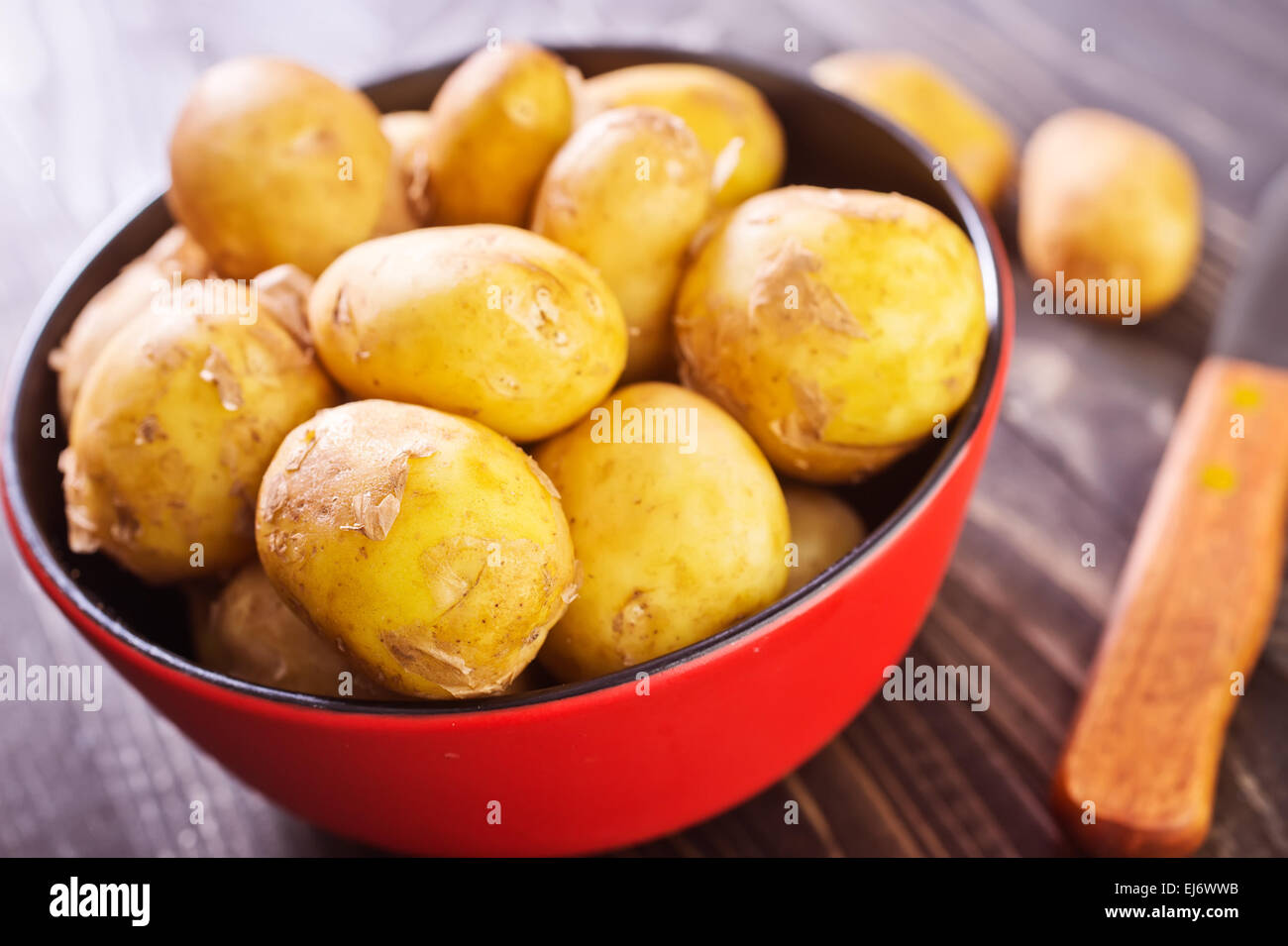 sliced raw potato on the kitchen table Stock Photo - Alamy