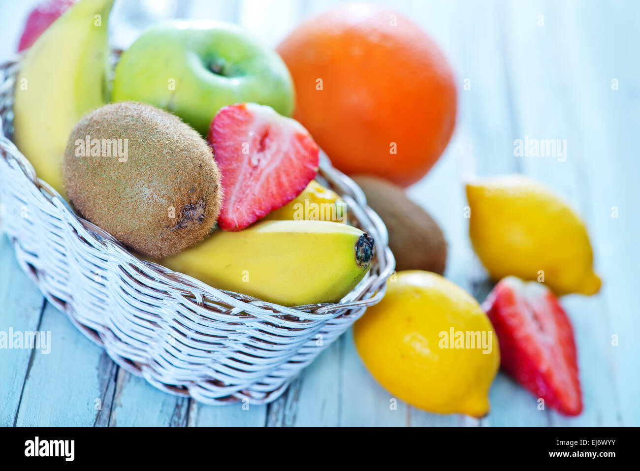 different kind of fruit ib basket on a table Stock Photo - Alamy