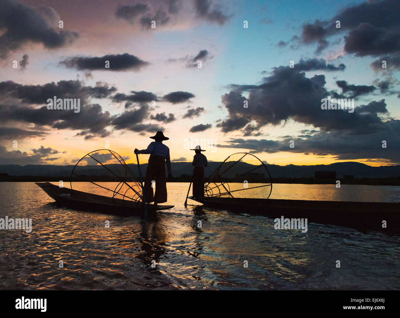 Myanmar silhouette sunrise fisherman hi-res stock photography and ...