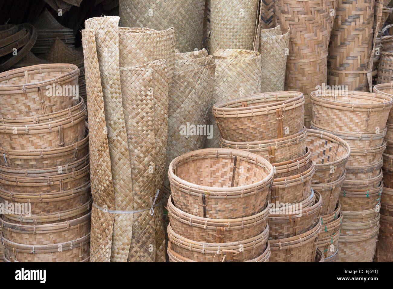 Selling bamboo baskets and sheets at the market, Mrauk-U, Rakhine State ...