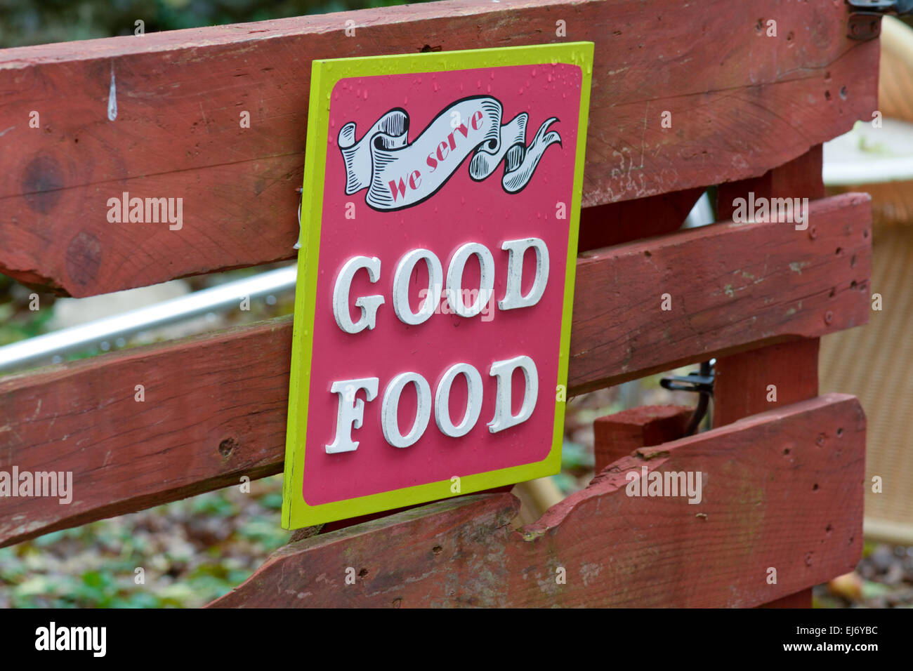 We serve Good Food sign outside cafe Stock Photo - Alamy