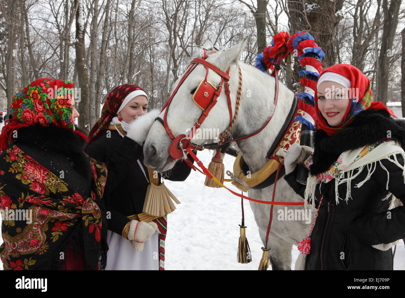 Maslenitsa festivities in Moscow: girls in Russian traditional clothes ...
