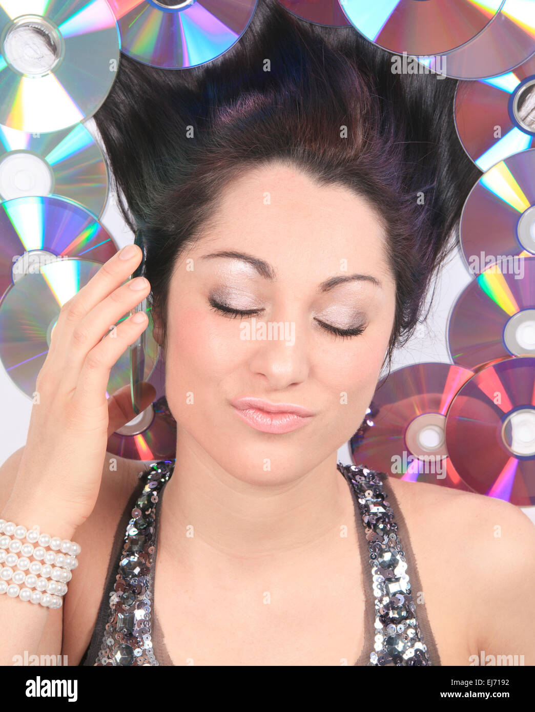 young girl with DVDs record lay on the ground Stock Photo - Alamy