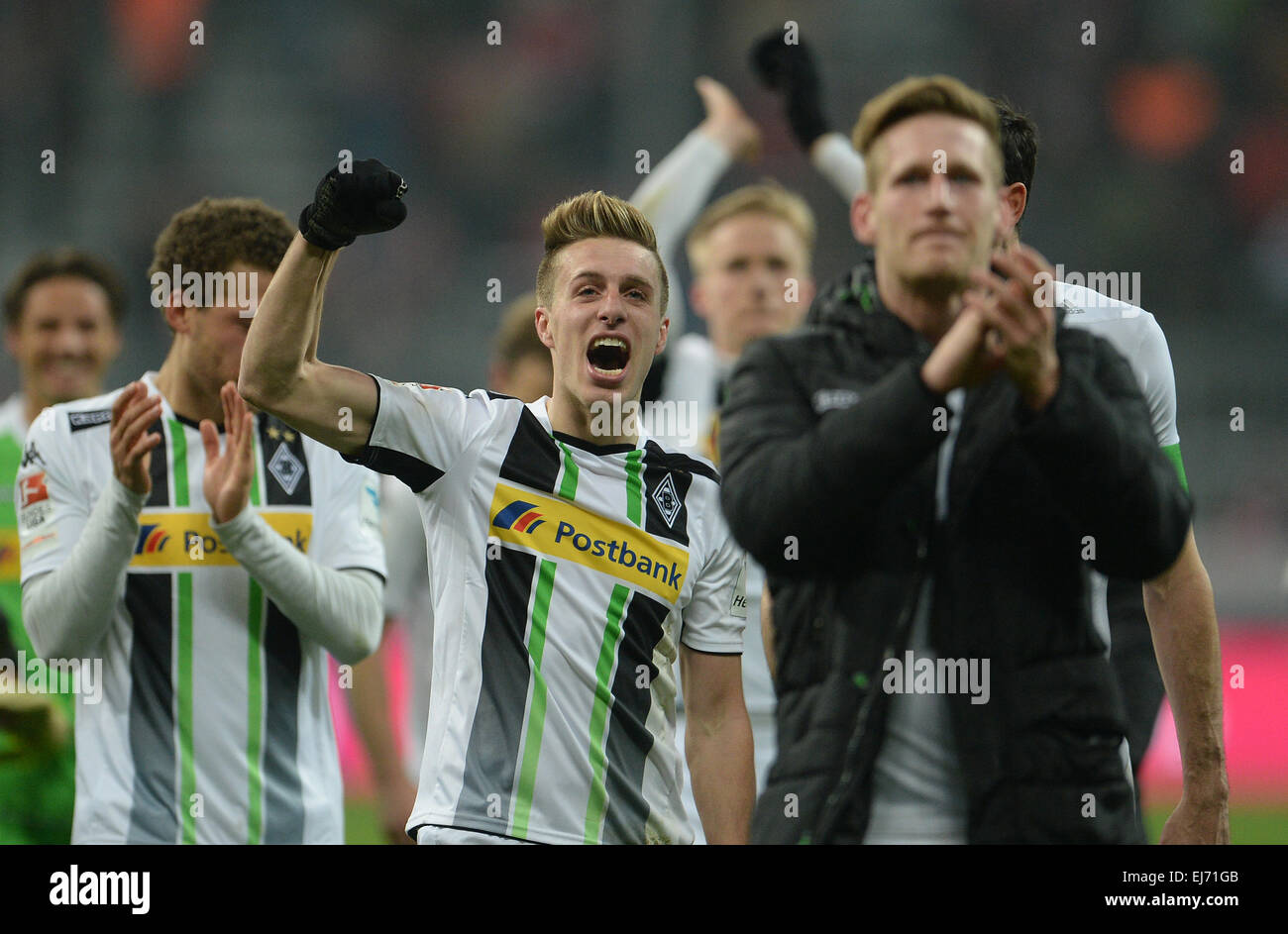 Munich, Germany. 22nd Mar, 2015. Gladbach's Patrick Herrmann (C ...