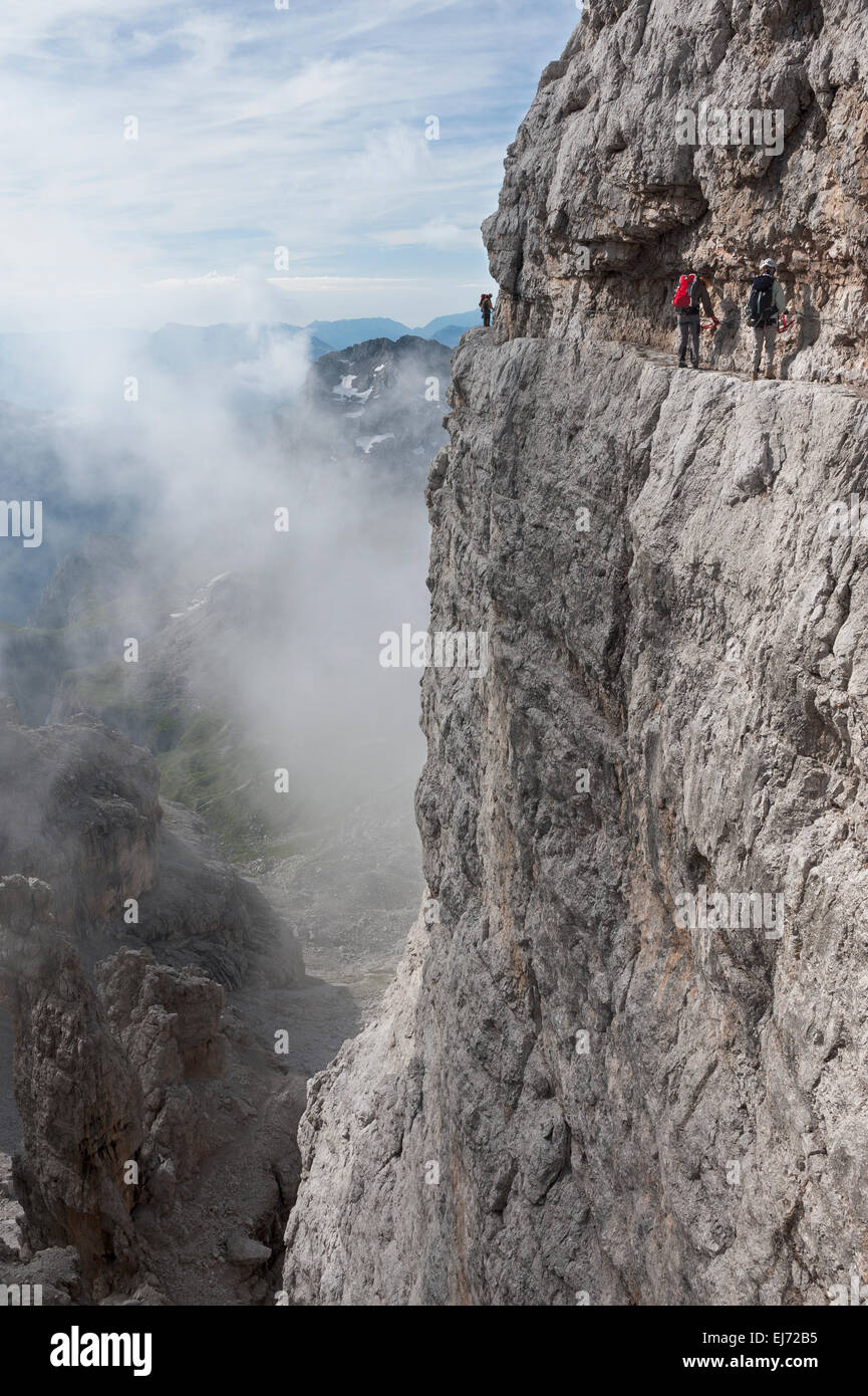 Climbers on rock band, via ferrata "Bocchette Centrali", no. 305 ...