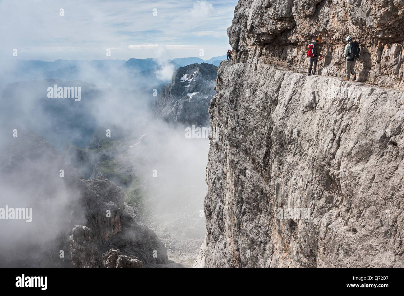 Climbers on rock band, via ferrata "Bocchette Centrali", no. 305 ...