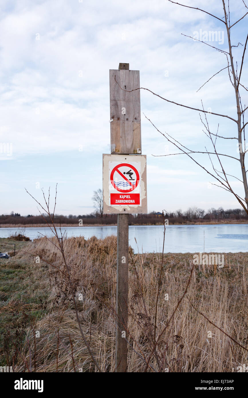 warning sign pond no swimming by local country breeding pond Stock ...
