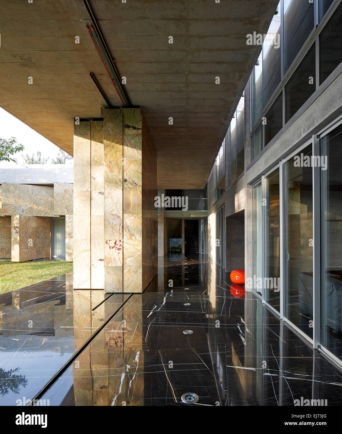 Courtyard view. House with walls, Ahmedabad, India. Architect: Matharoo ...
