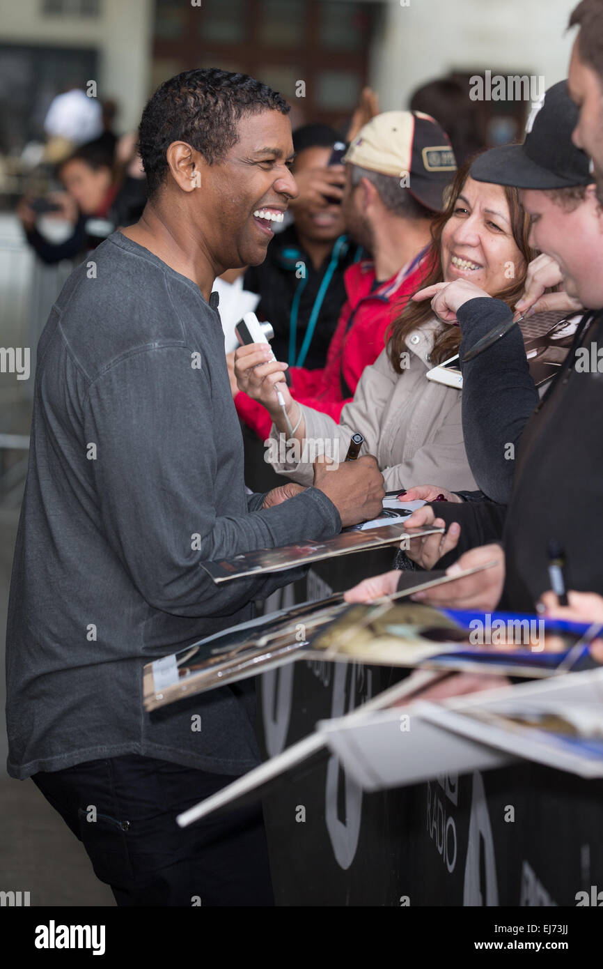 Denzel Washington signing autographs for fans outside the BBC Radio 1 ...
