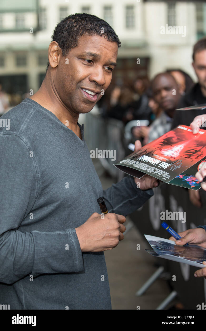 Denzel Washington signing autographs for fans outside the BBC Radio 1 ...
