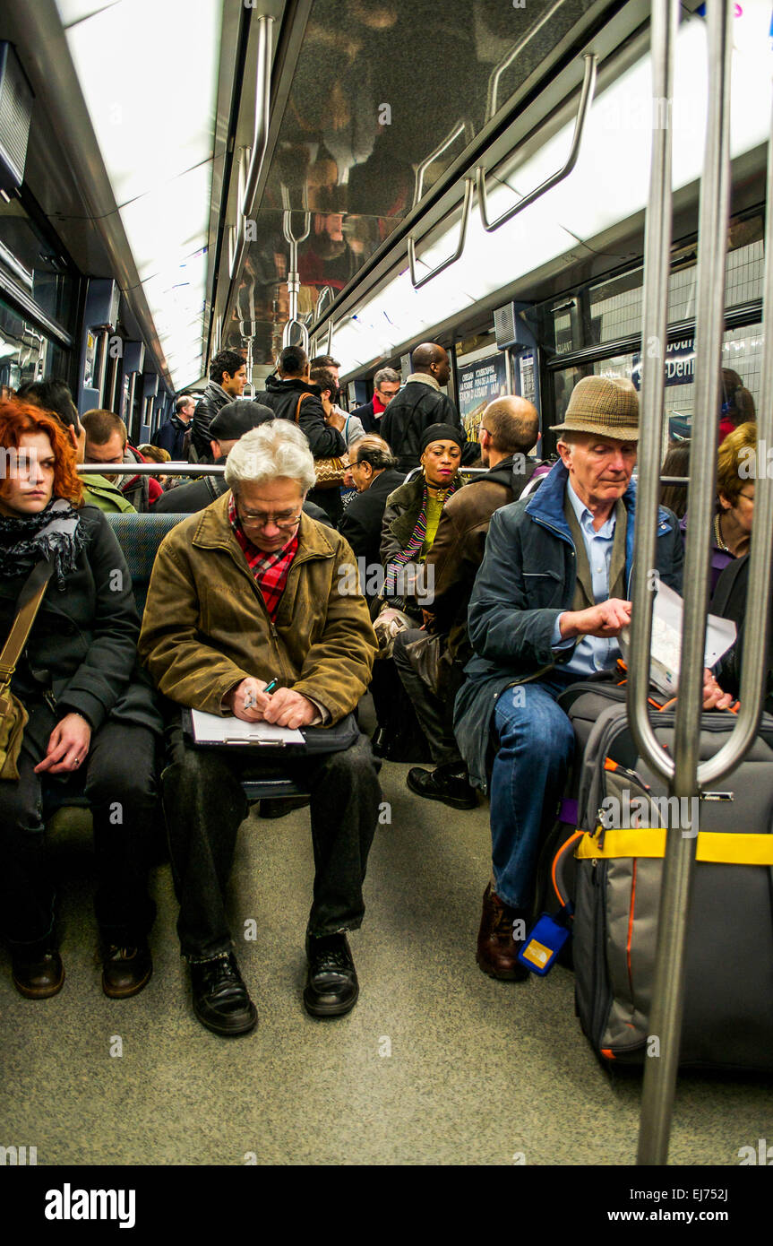 A full train car in the Paris Metro during rush hour Stock Photo - Alamy