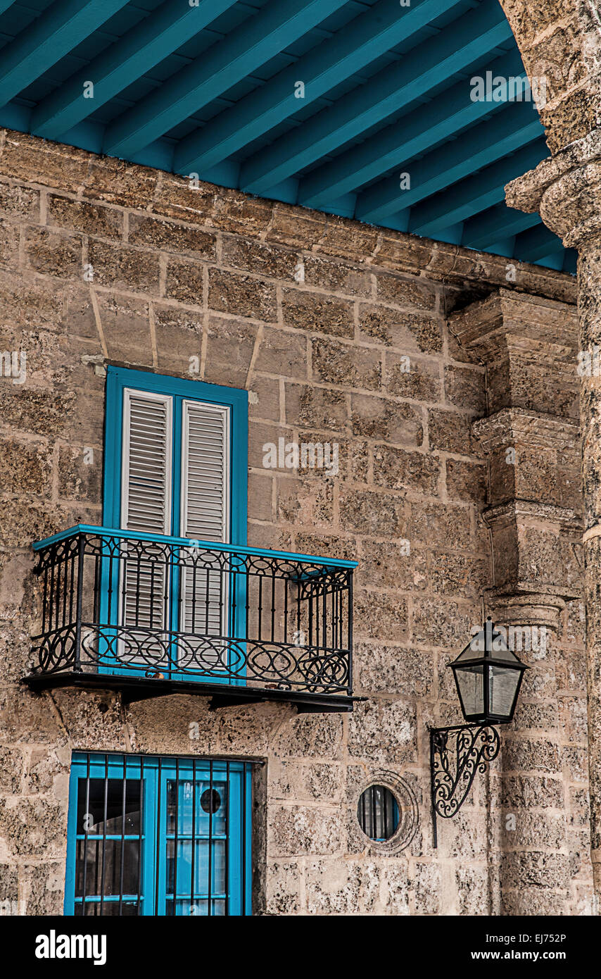 A restored balcony and window shutters on a restored building in Havana ...