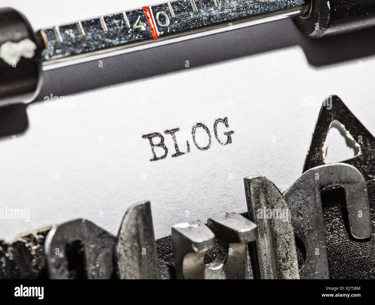 Typewriter with white paper page on wooden table. sample text Blog ...