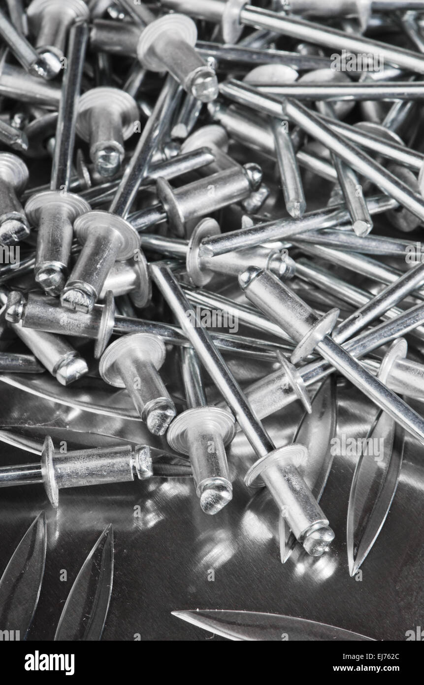 Aluminium assembly rivets, close up Stock Photo - Alamy