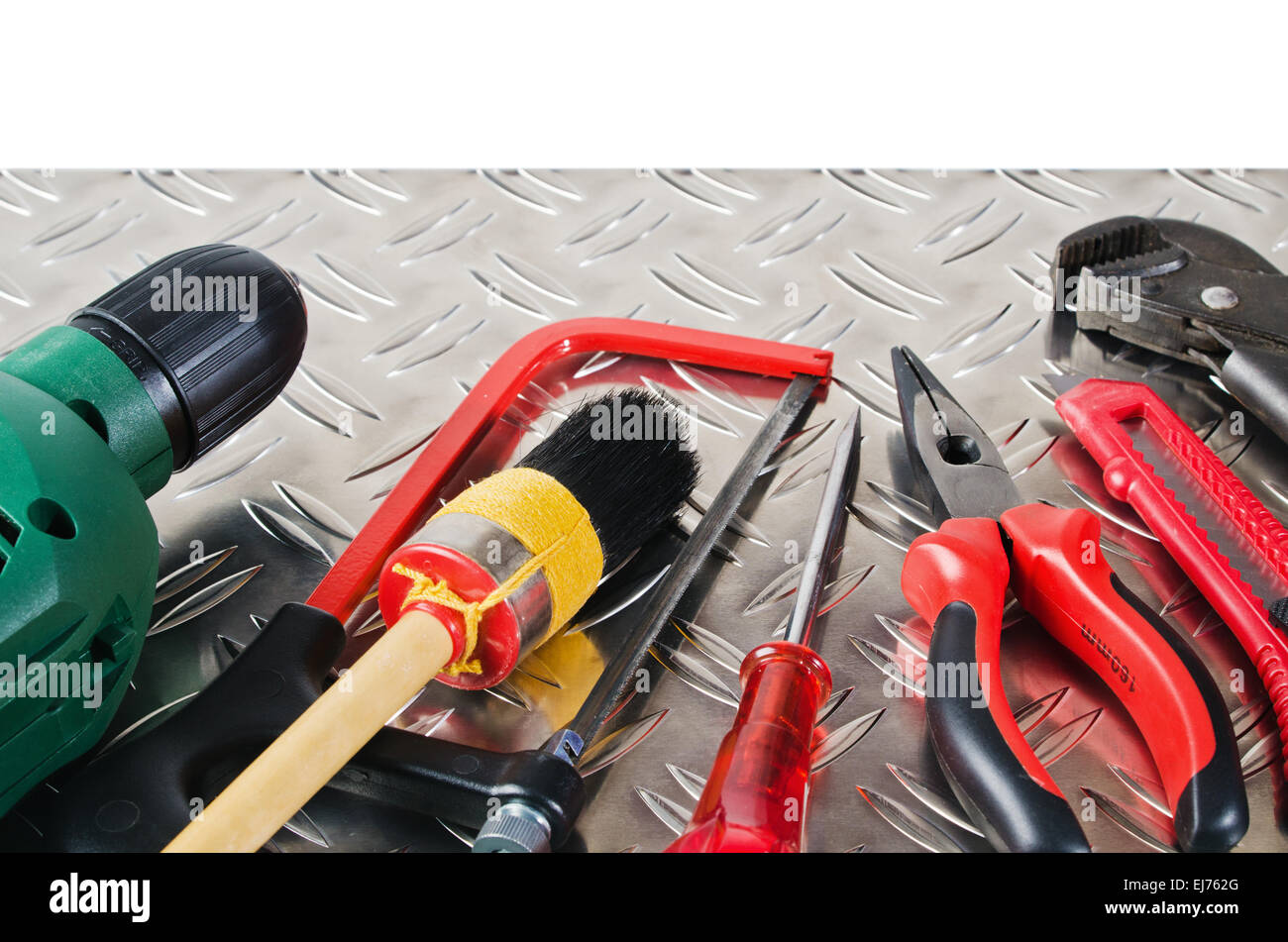 Set of working tools on a metal surface Stock Photo - Alamy