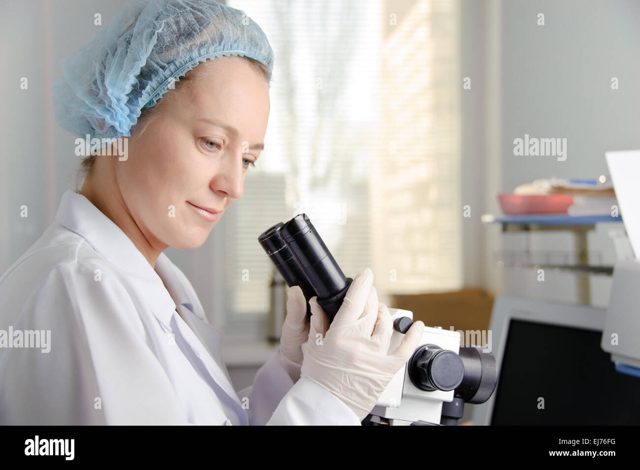 Doctor with Microscope Stock Photo - Alamy