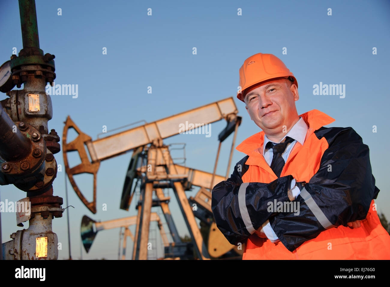 Engineer in an Oil field Stock Photo - Alamy
