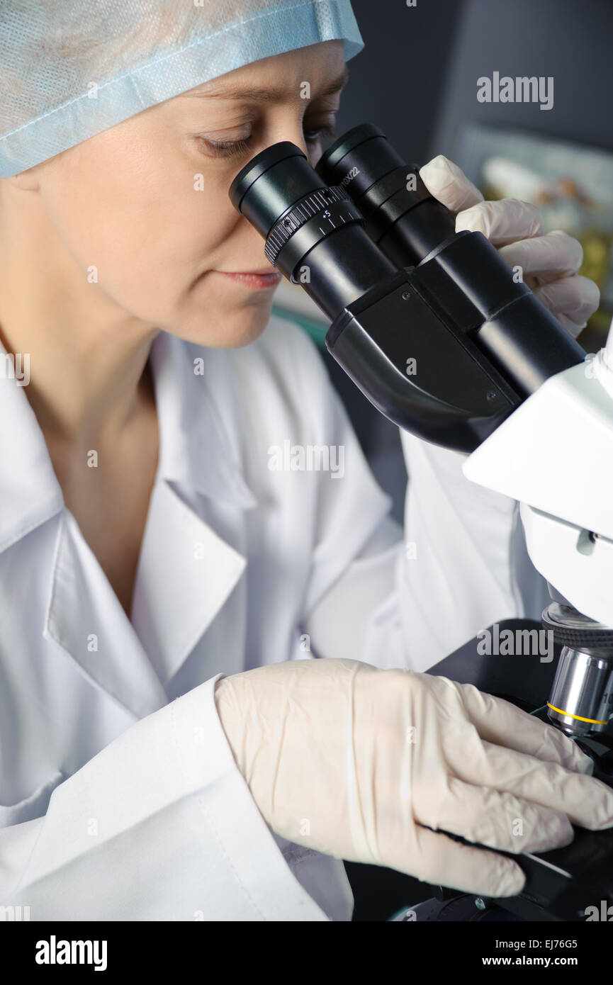 Doctor with Microscope. Scientific research Stock Photo - Alamy