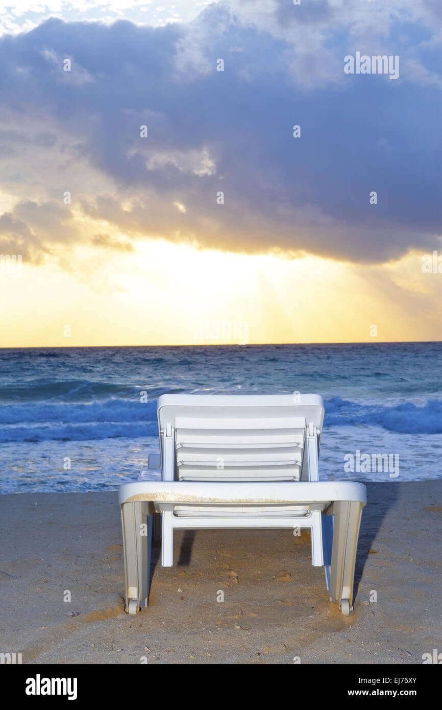 Empty chaise lounge before ocean Stock Photo - Alamy