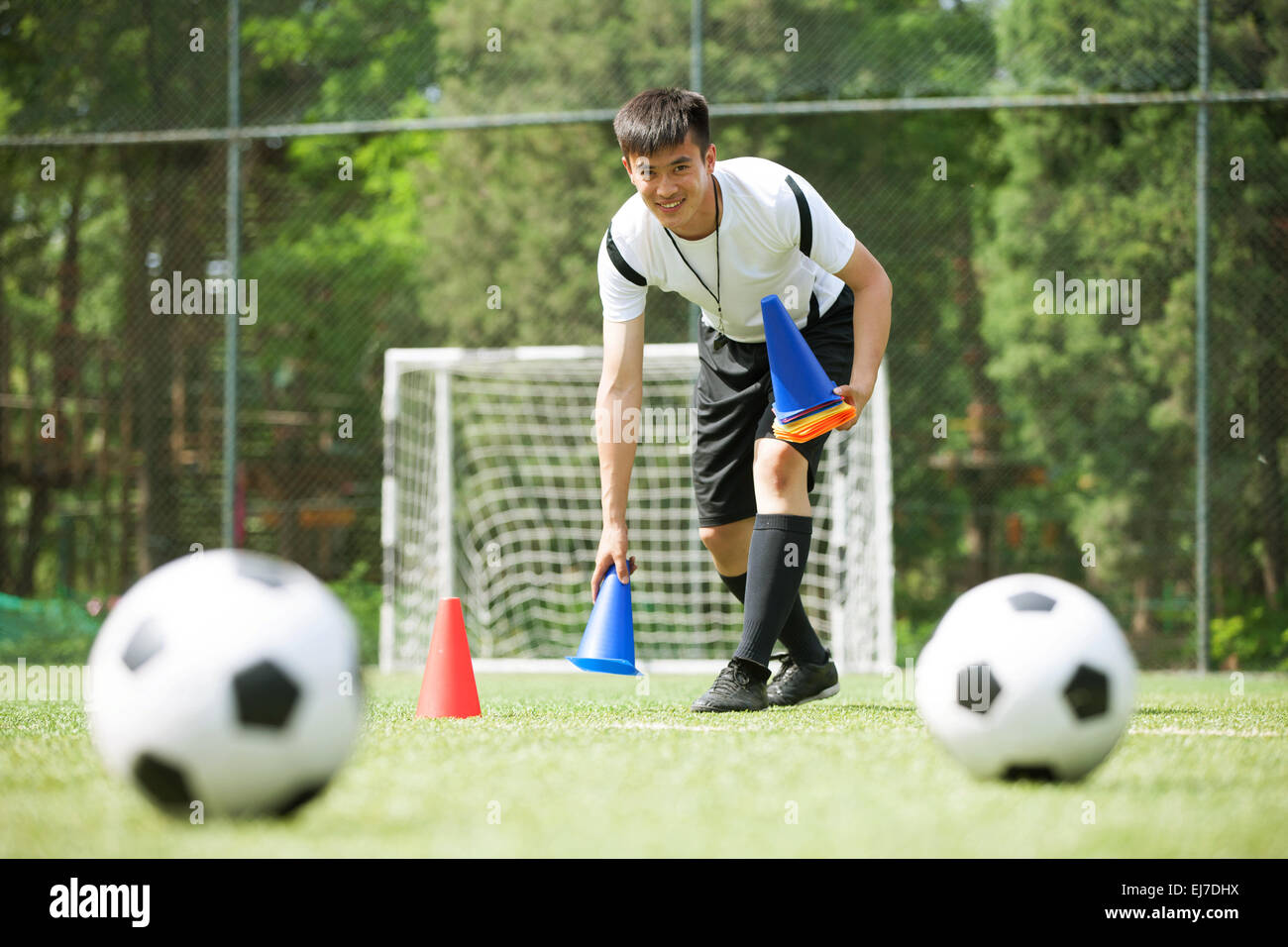 Football coach in preparation for the training Stock Photo - Alamy