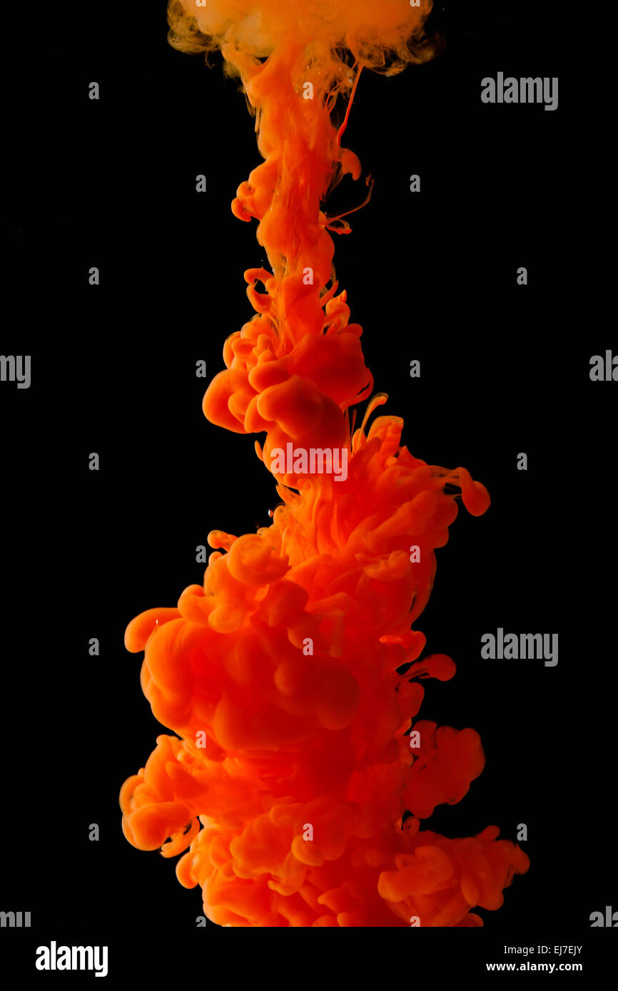 Mixing paint ink water red hi-res stock photography and images - Alamy