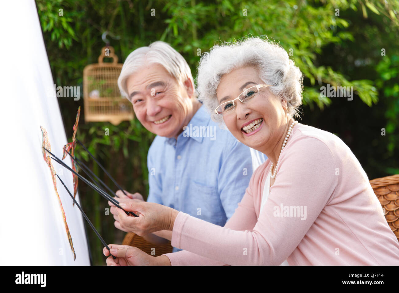Elderly couple was shadow puppet show Stock Photo - Alamy