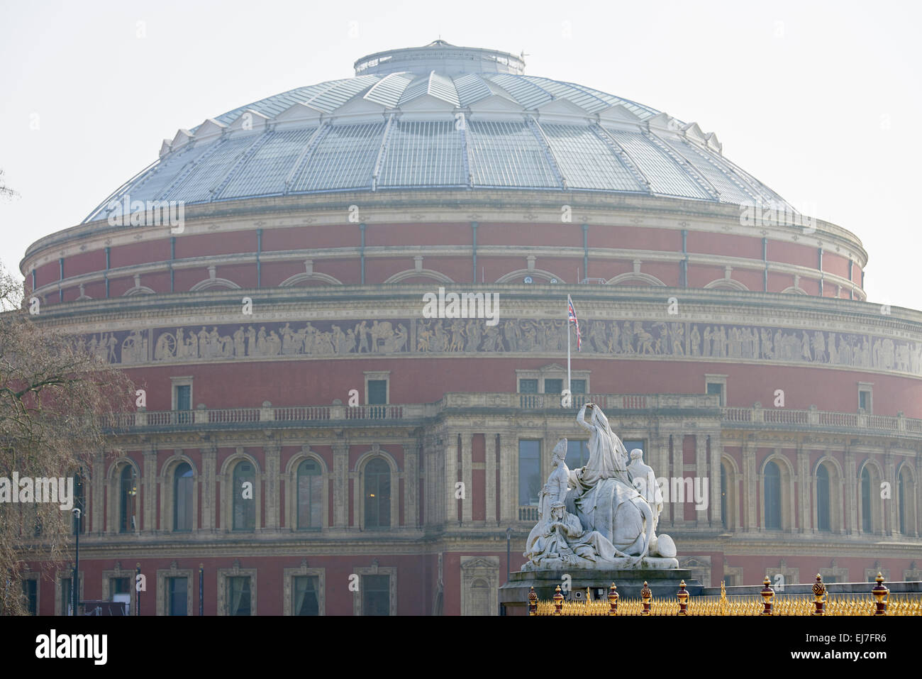 Albert Memorial statue overlooking hazy Royal Albert Hall, in London ...