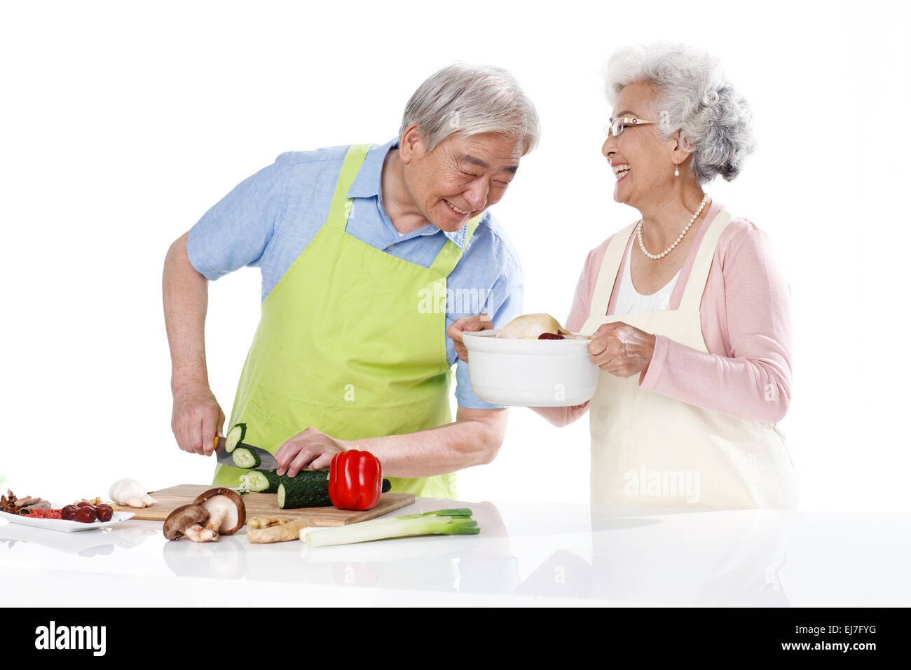 The old couple in the kitchen cooking Stock Photo - Alamy
