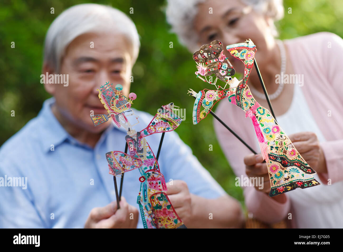 The old couple took the shadow puppet Stock Photo - Alamy