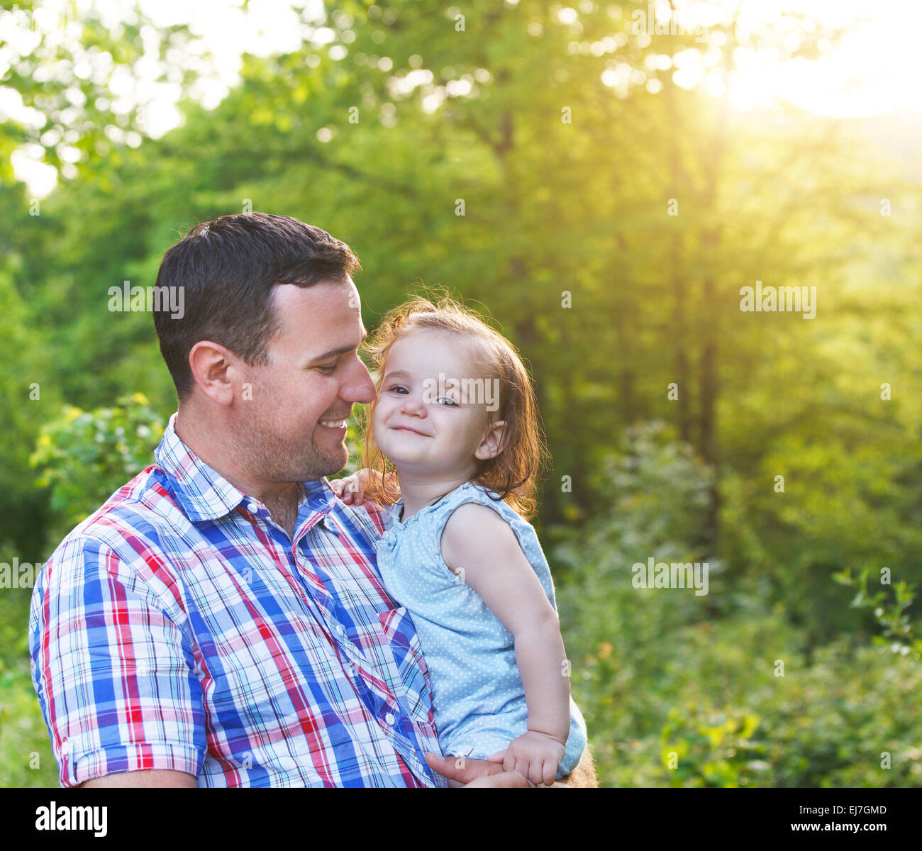 Happy young father with little baby daughter Stock Photo - Alamy