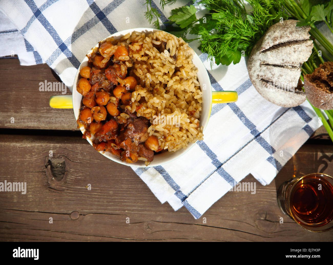 Uzbek national dish plov in a bowl Stock Photo - Alamy