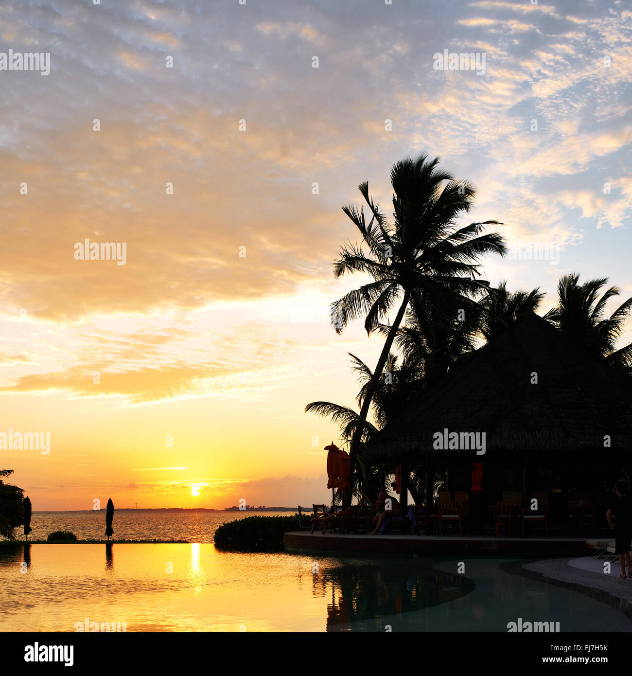 Sunset at Maldivian beach Stock Photo - Alamy