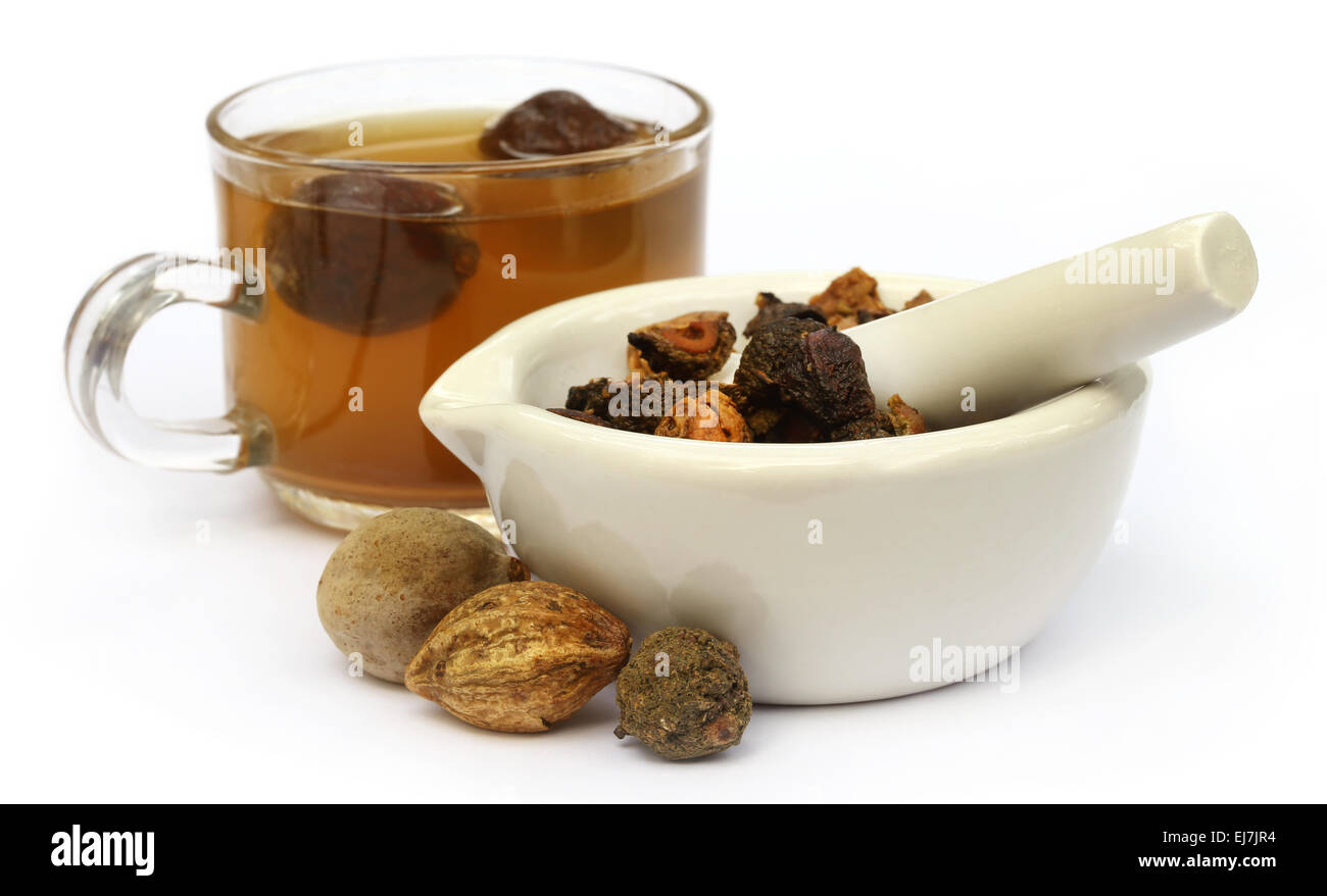 Tea made from Triphala, a combination of ayurvedic fruits with mortar ...