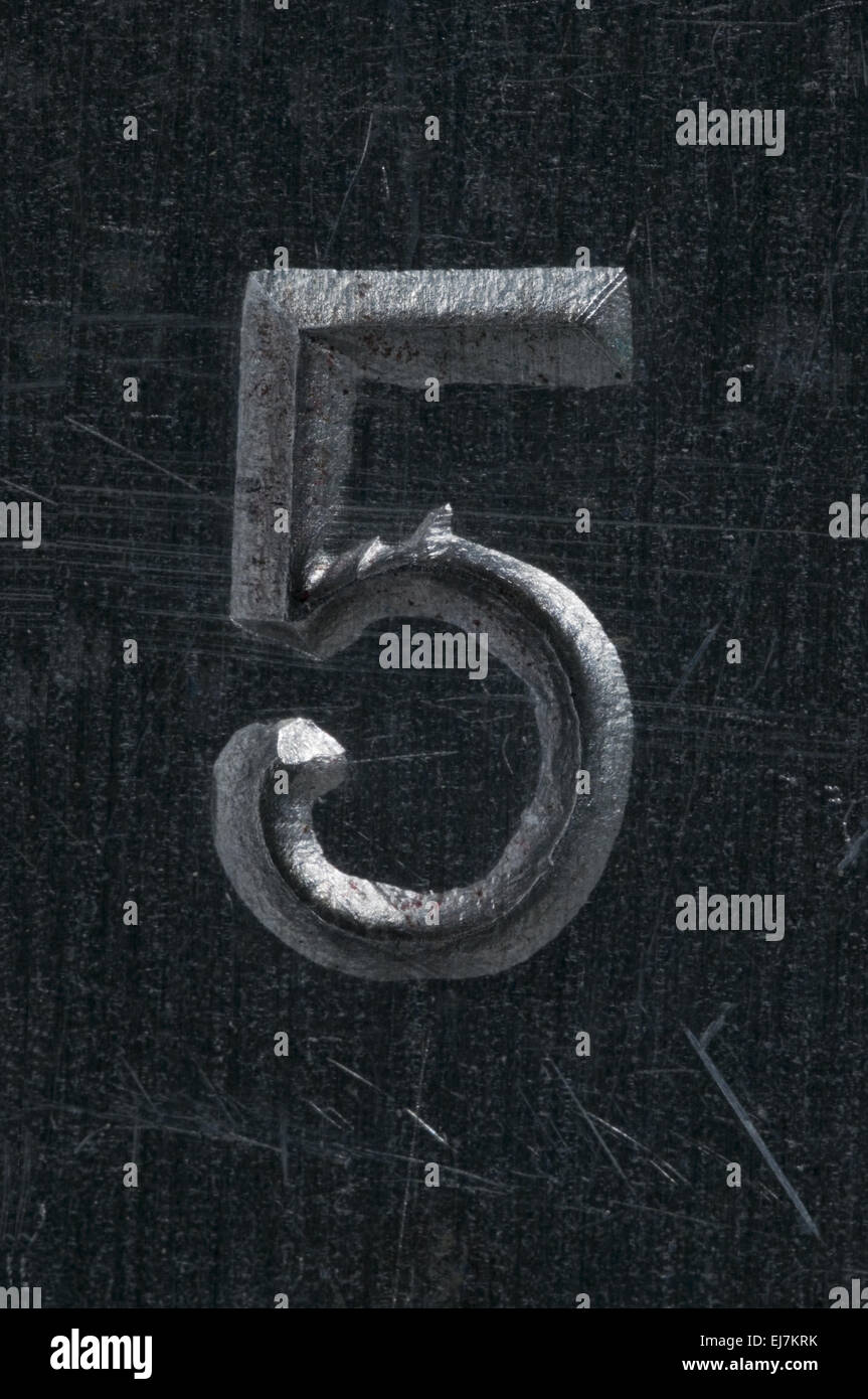 punched number five Stock Photo - Alamy