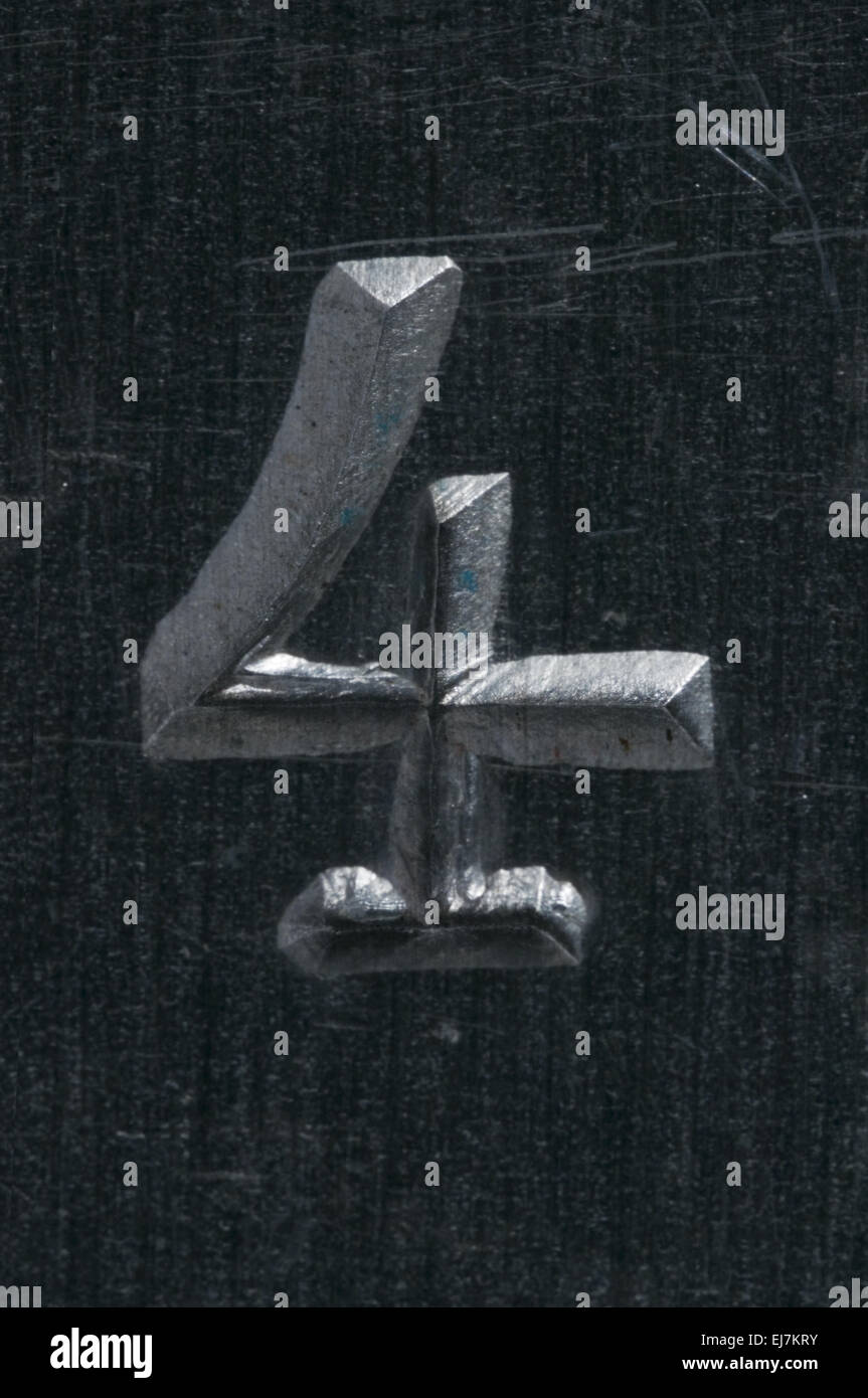 punched number four Stock Photo - Alamy