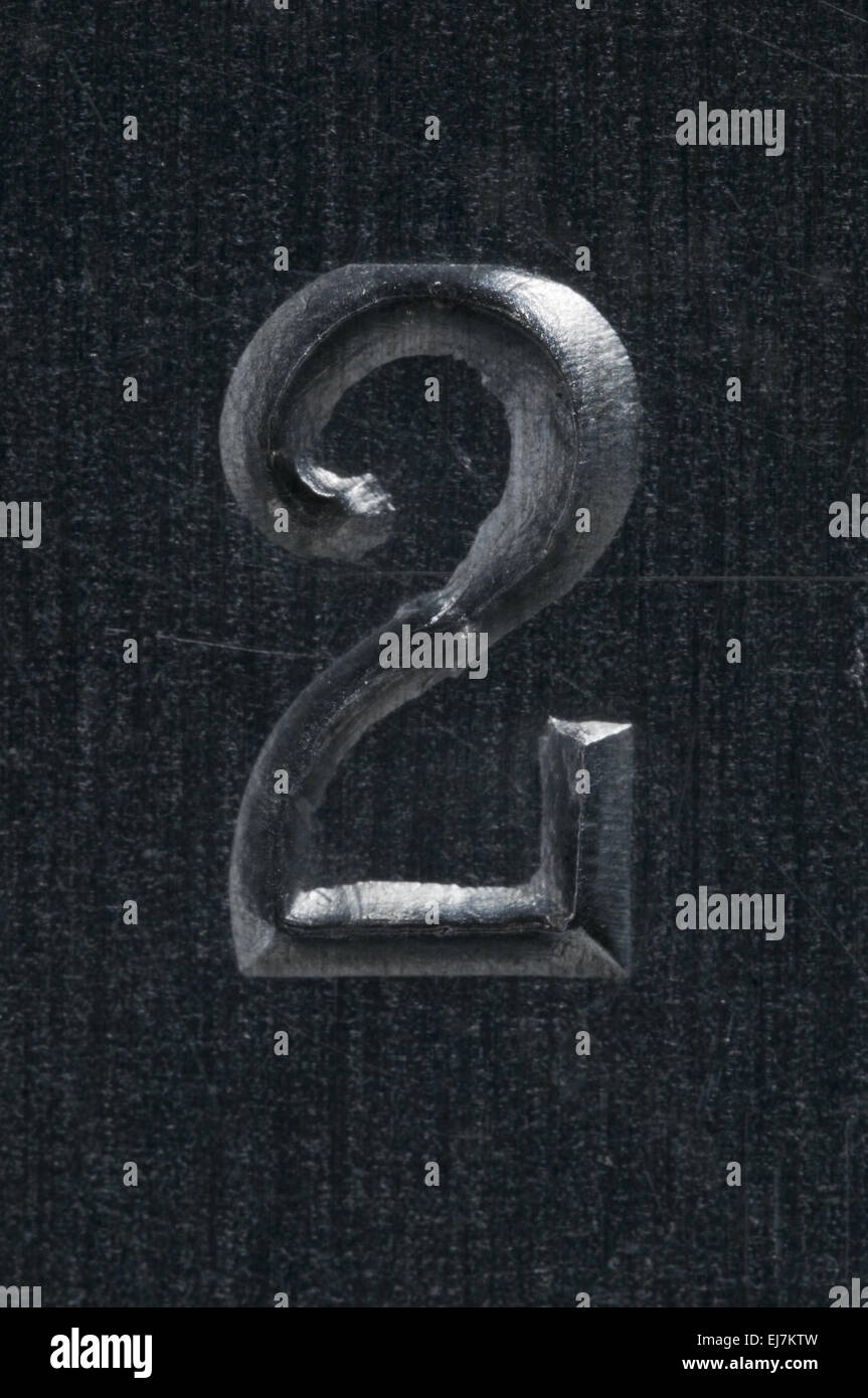 punched number two Stock Photo - Alamy