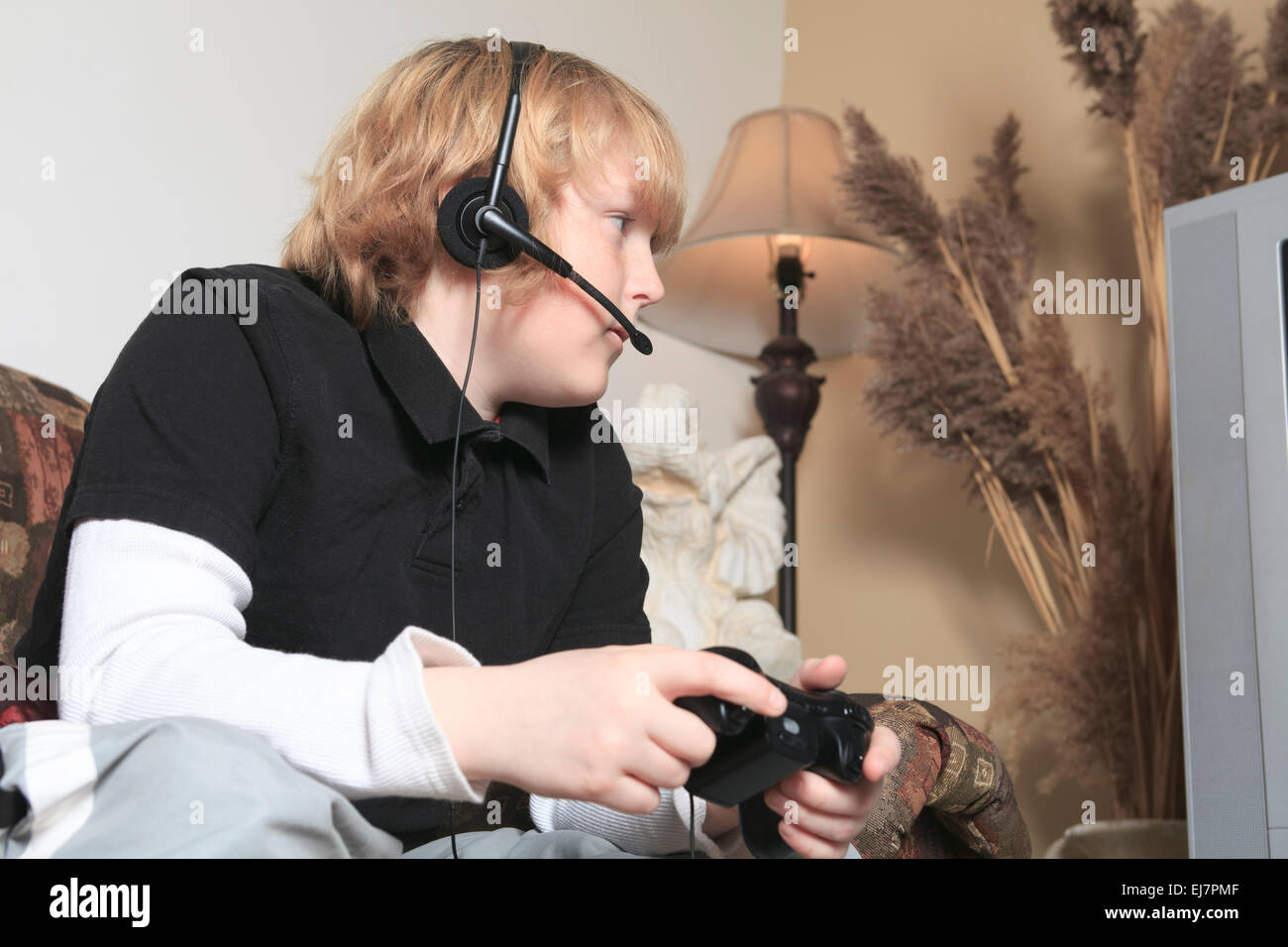 A teen with video game addiction problem Stock Photo - Alamy